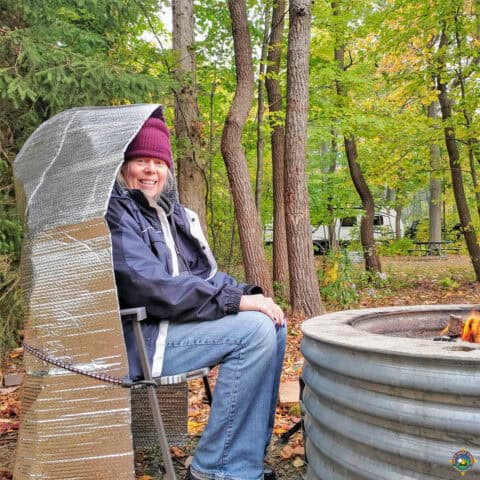 DIY Fire Reflector to Hold the Heat from a Campfire